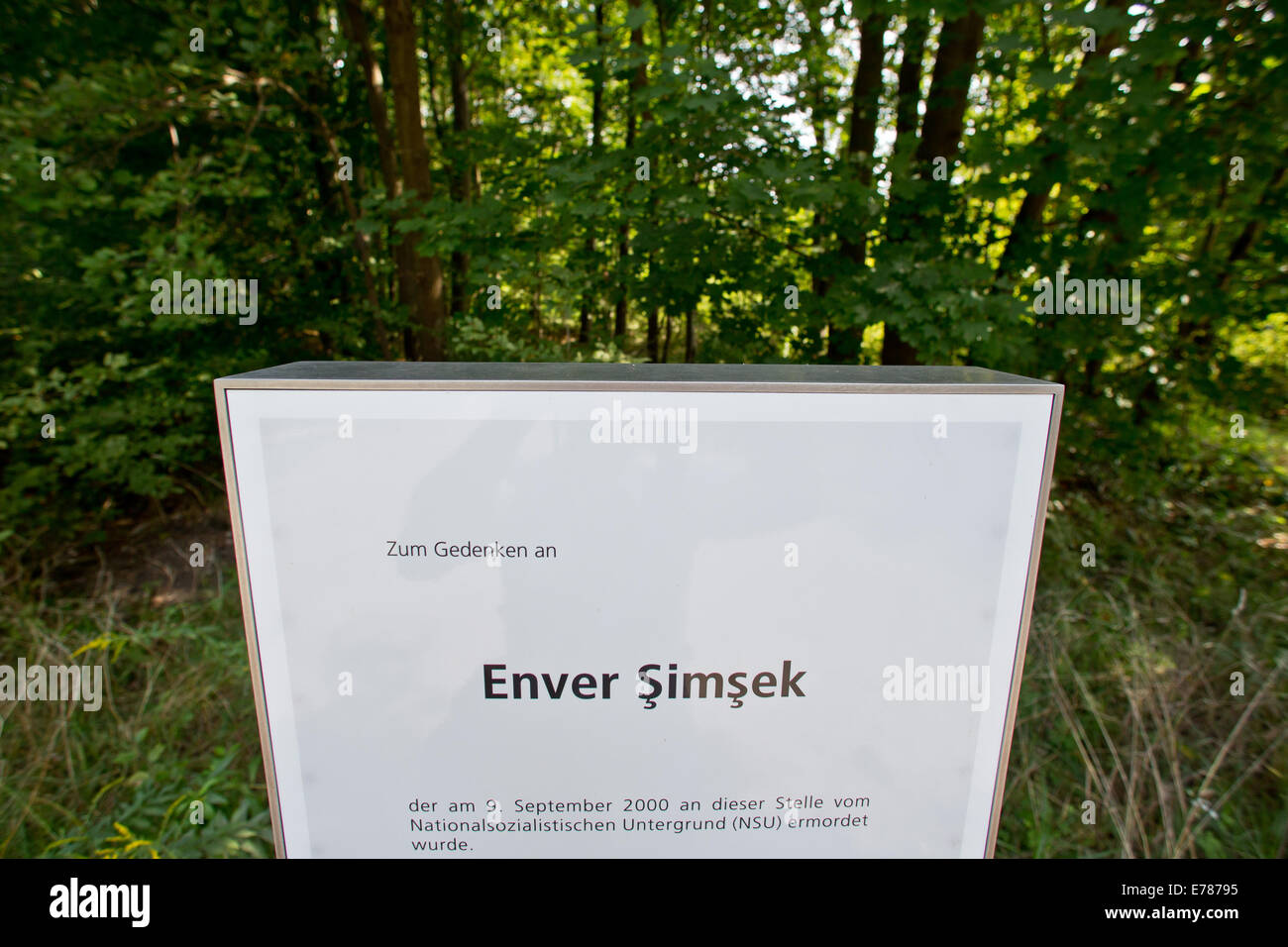 A commeorative plaque is pictured during a rally in memory of Enver ...