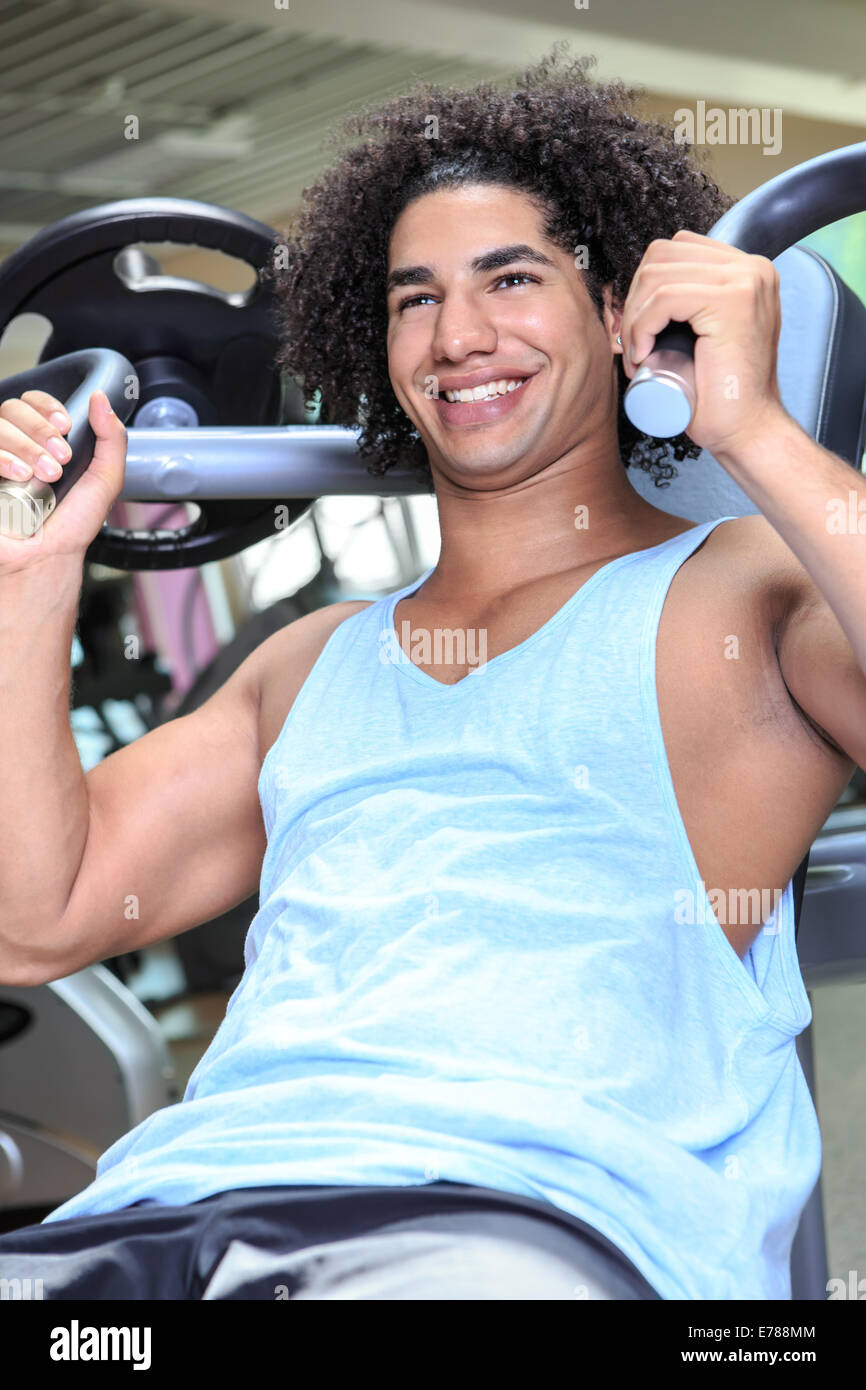 young man at workout in a gym Stock Photo - Alamy