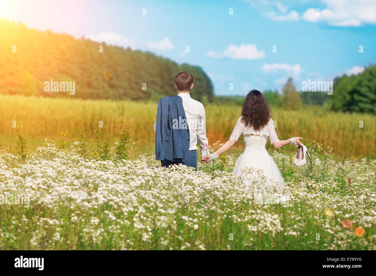 Happy couple spring field hi-res stock photography and images - Alamy