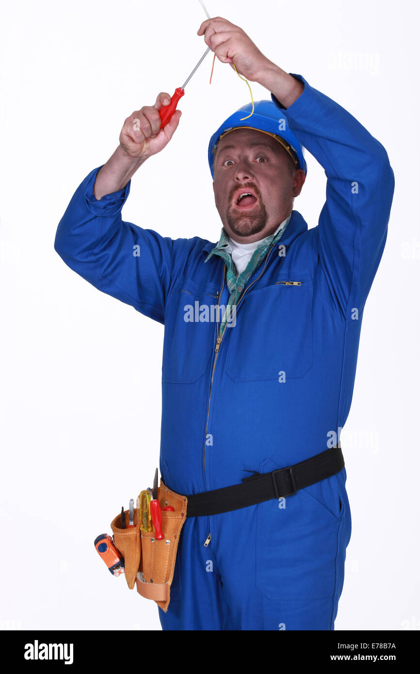Electrician getting a shock Stock Photo - Alamy