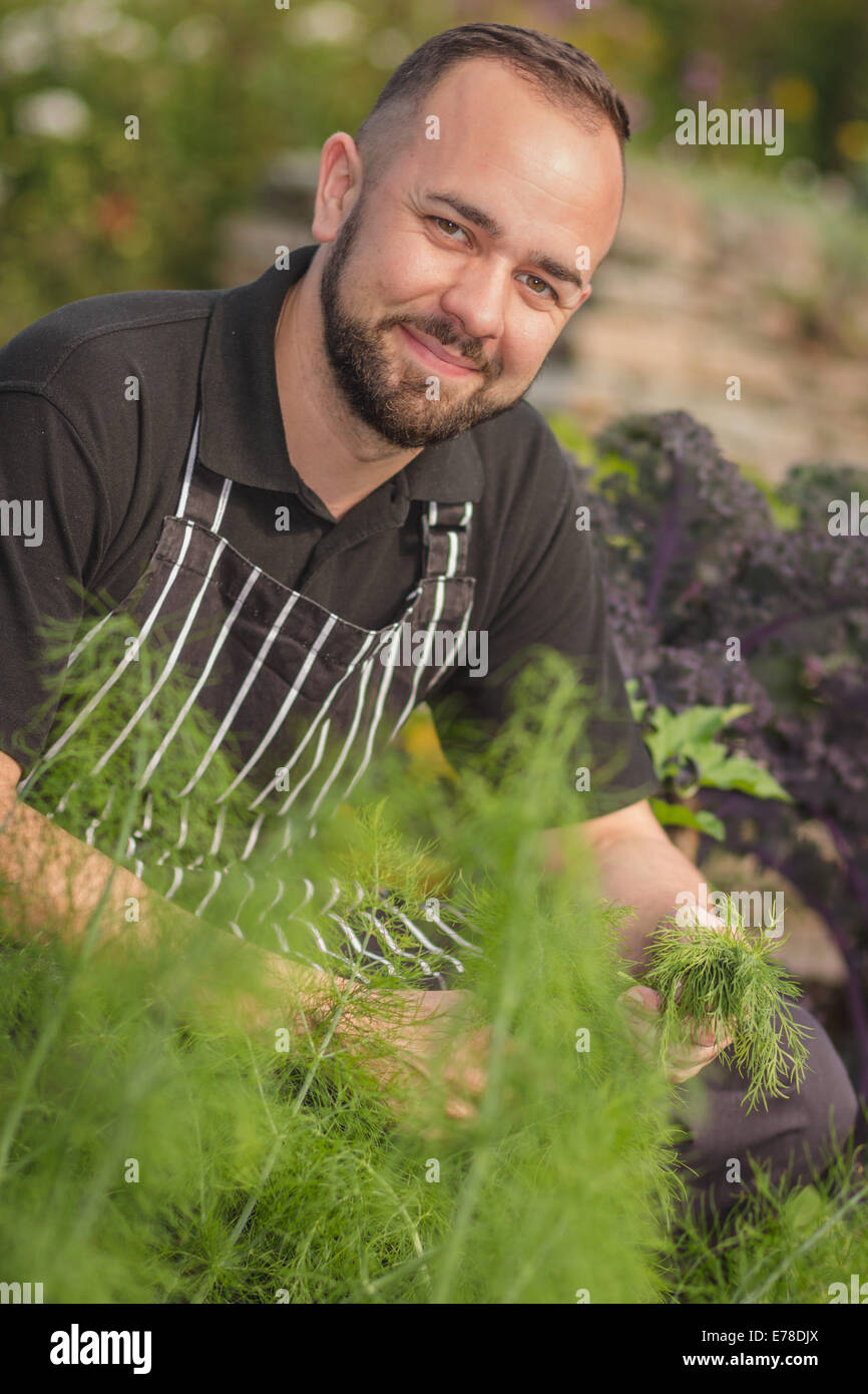 Male chef teaching young woman hi-res stock photography and images - Alamy