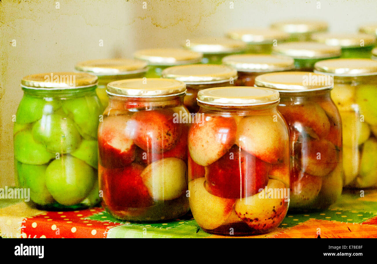 Jars of homemade fruit preserves - vintage photo Stock Photo - Alamy