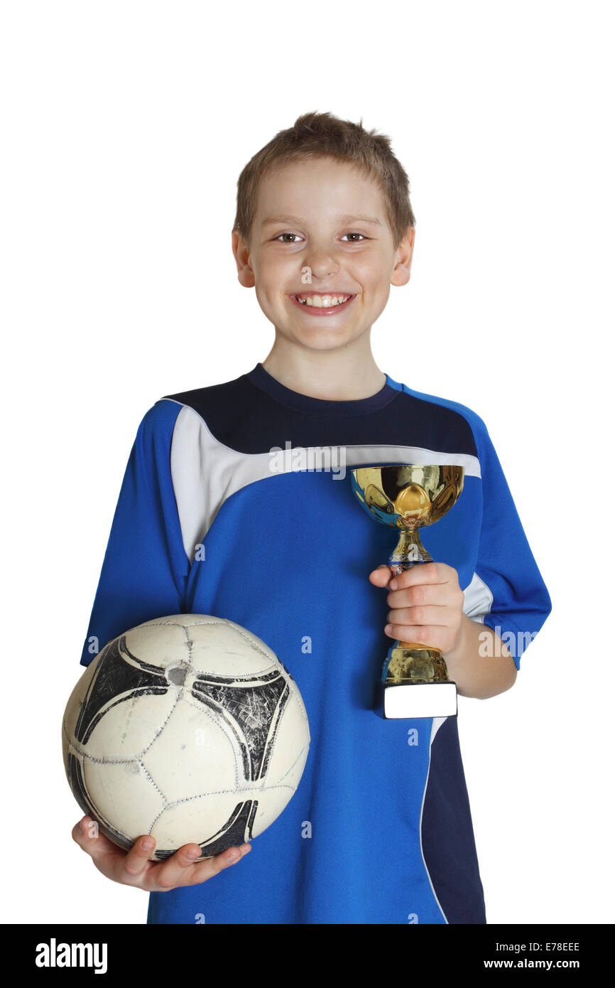 Happy boy with football and winner cup (with placeholder for text) in ...