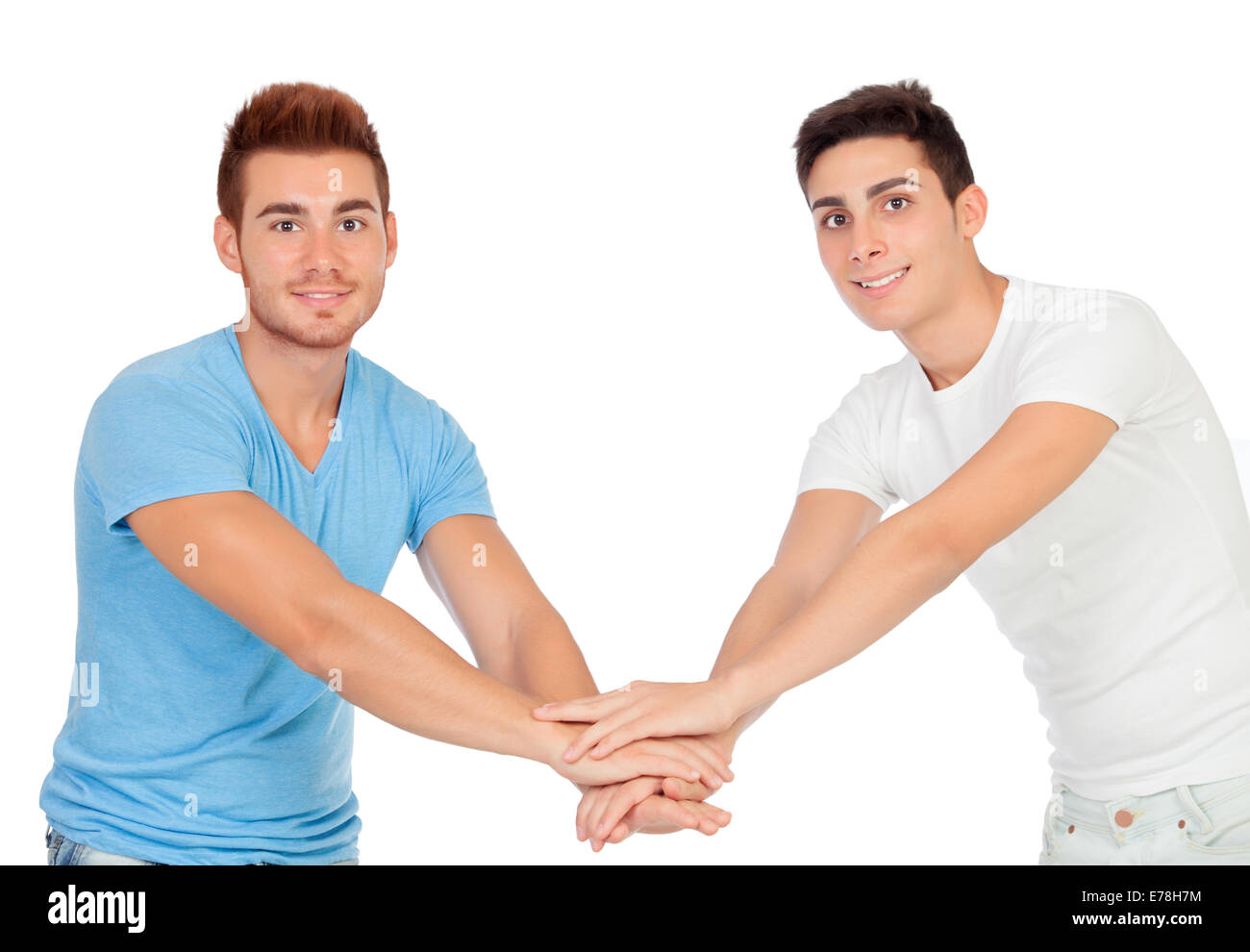 Couple of best friends shaking hands isolated on a white background ...