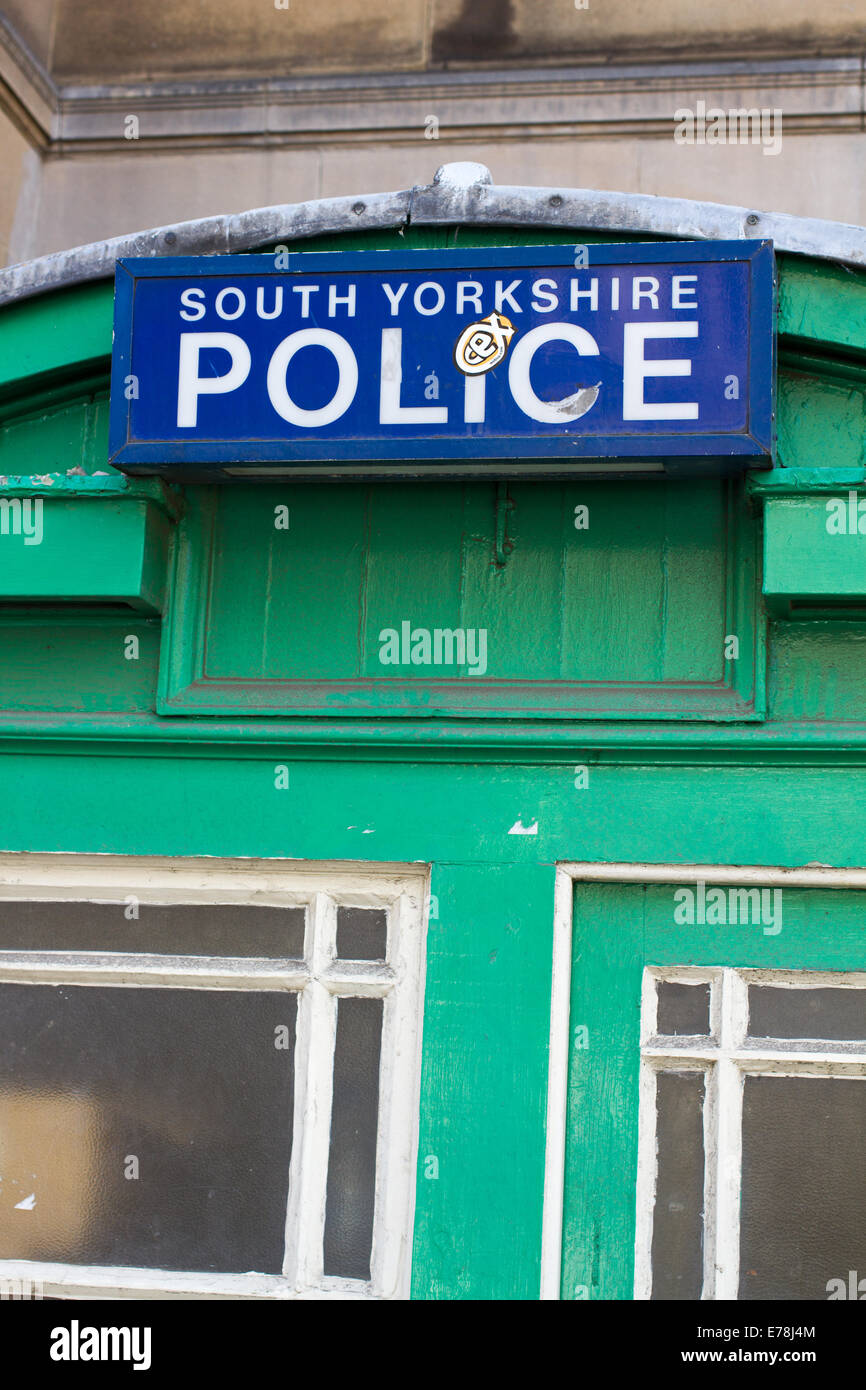 South Yorkshire police sign and logo on old green police box in ...