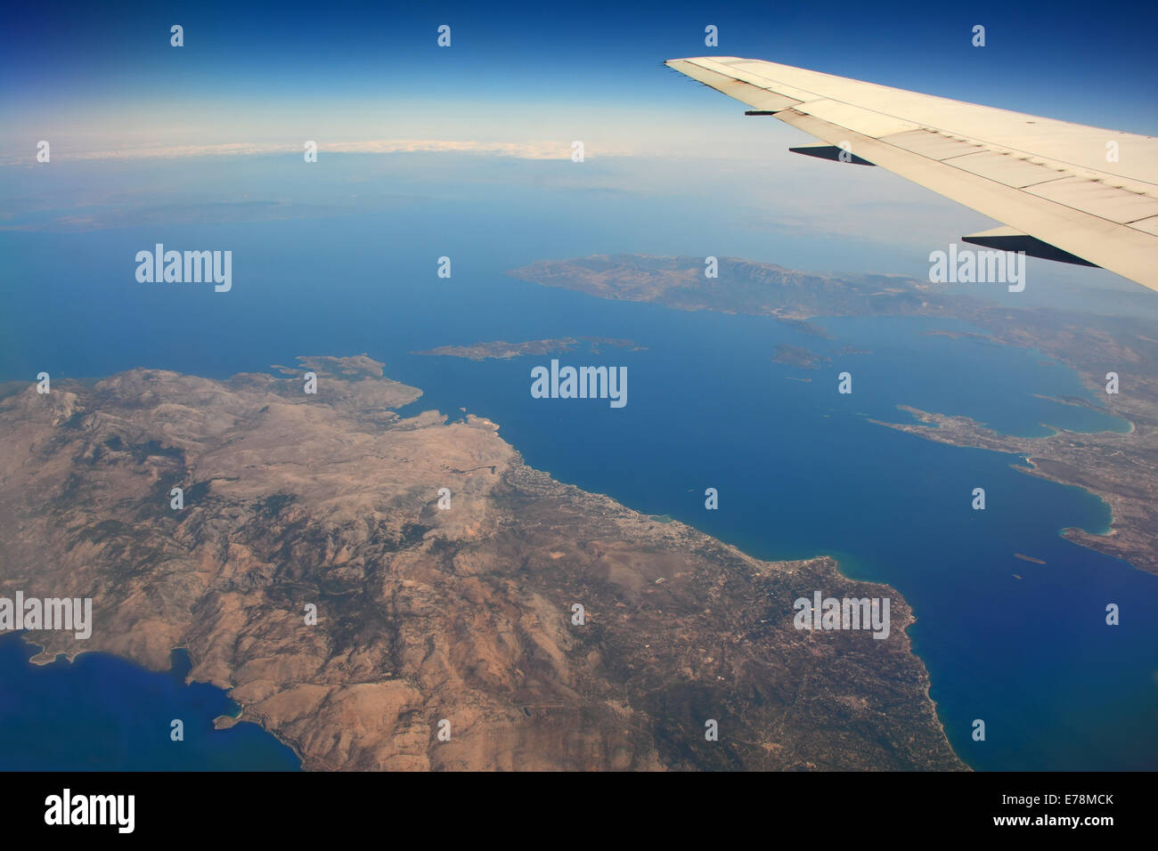 Flight above Greek island Stock Photo - Alamy