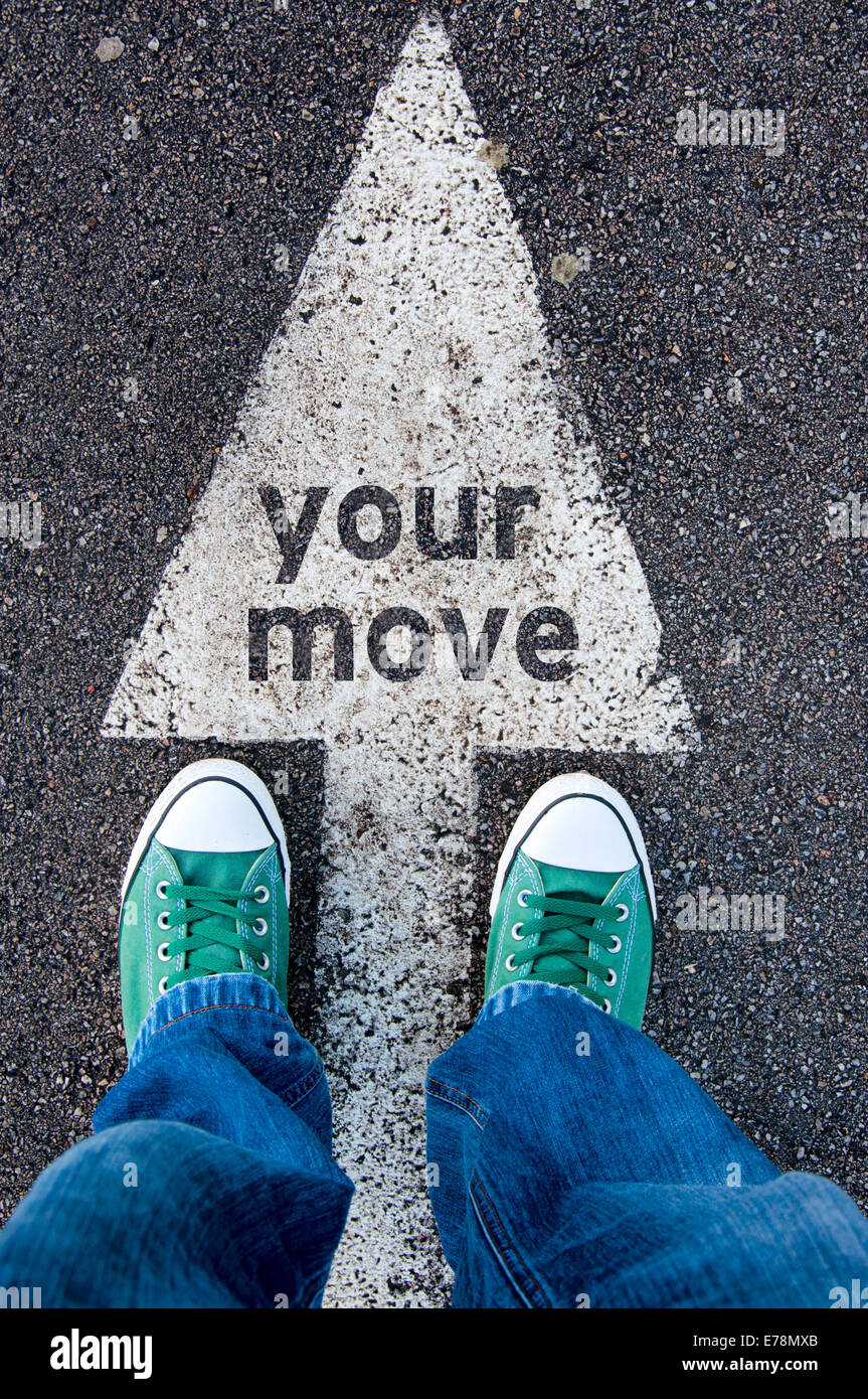 Green shoes standing on your move sign Stock Photo - Alamy