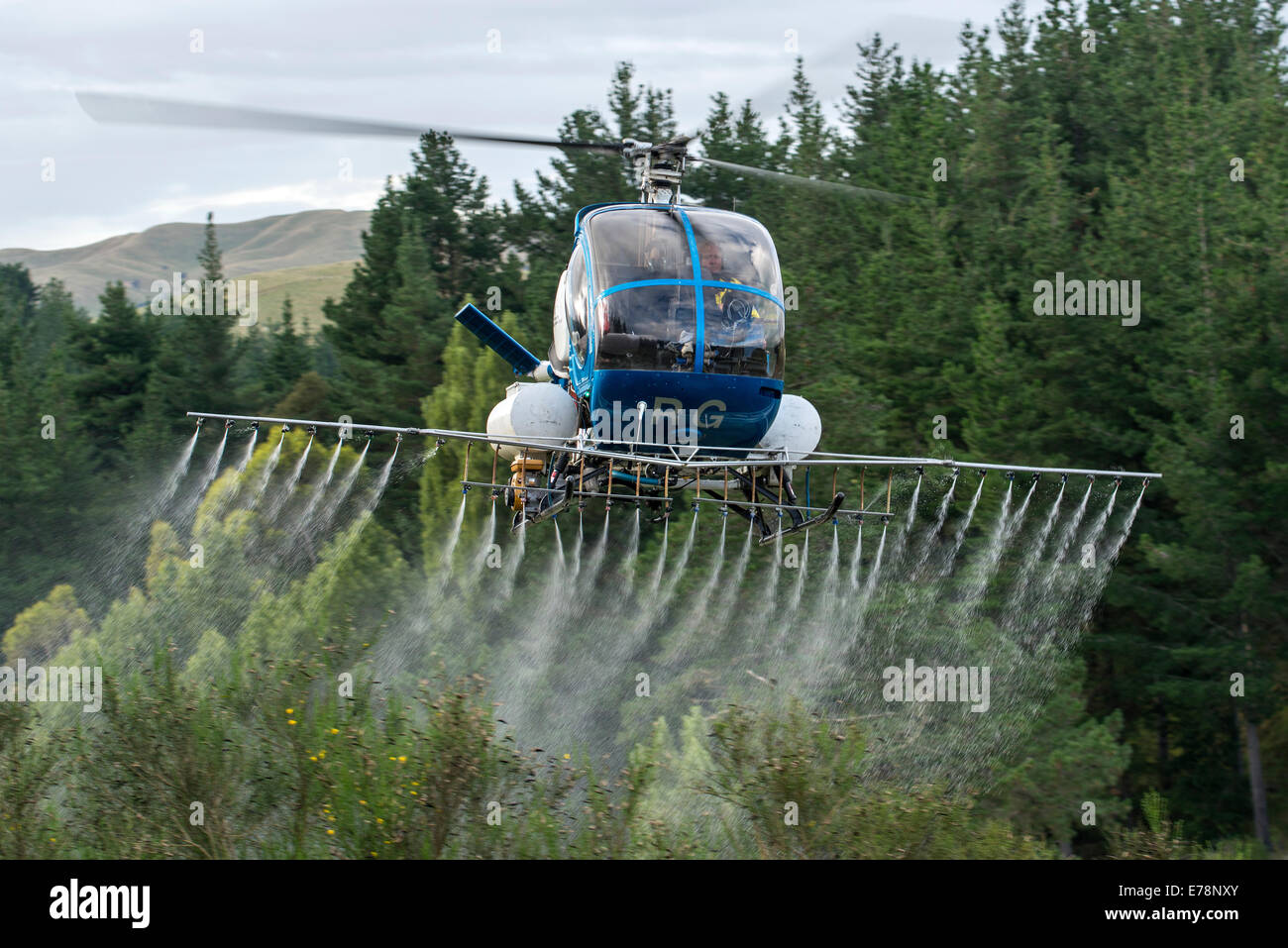 New zealand helicopter spraying hi-res stock photography and images - Alamy