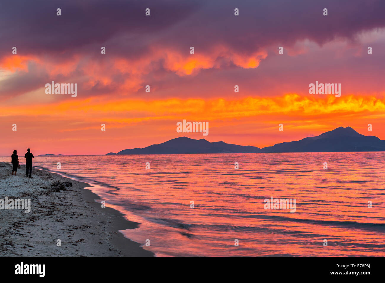 Sunset over sea in Greece Stock Photo - Alamy