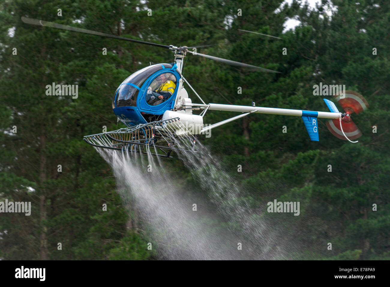 New zealand helicopter spraying hi-res stock photography and images - Alamy