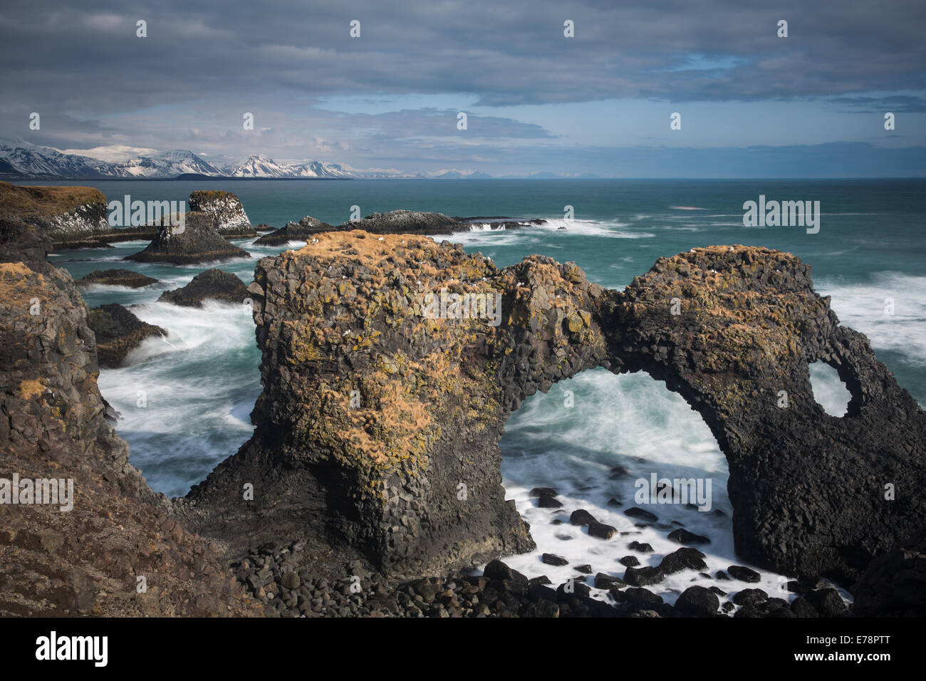 the rock arch of Gatklettur on the coast nr Arnastapi, Snaefellsnes ...
