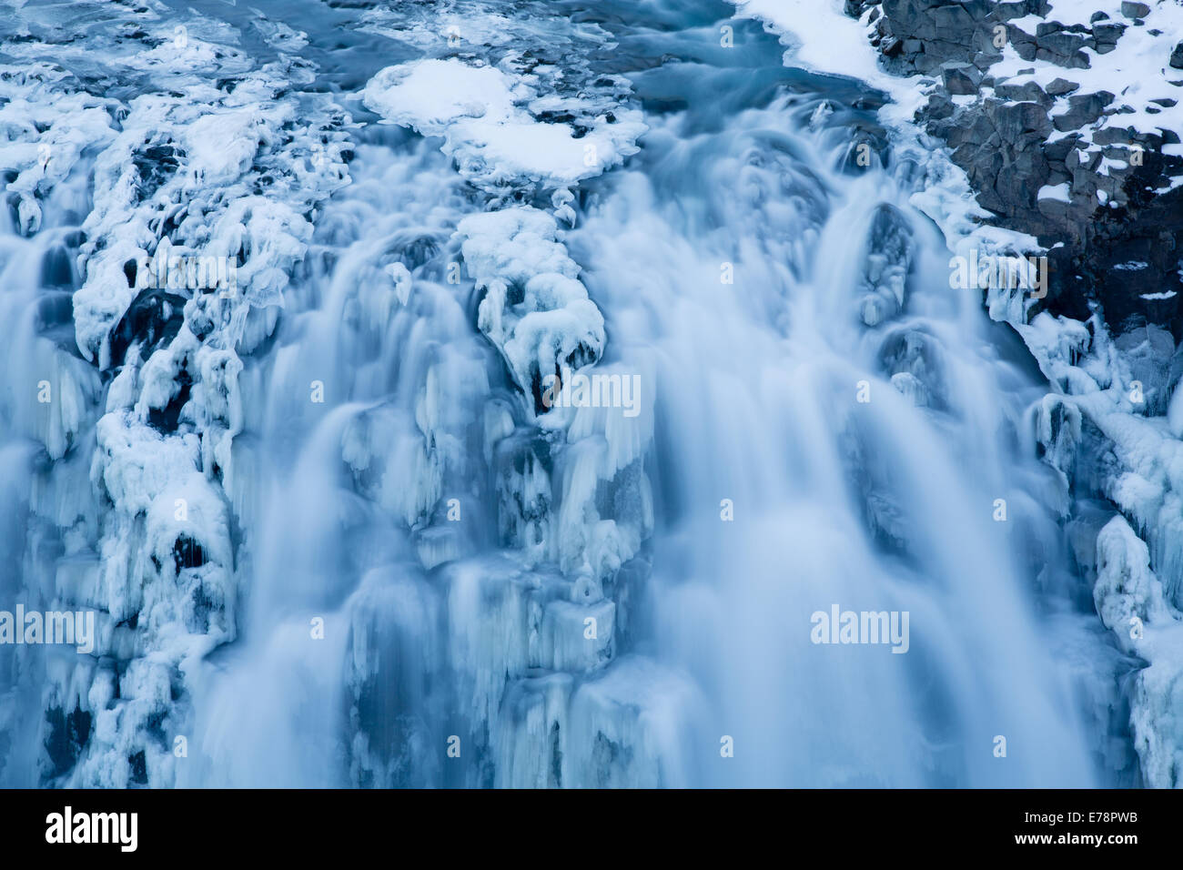 Gullfoss in winter with the frozen waterfall in the canyon of Hvítá ...