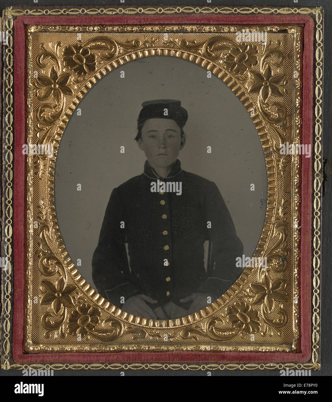 This photograph shows an unidentified young soldier wearing a Union ...