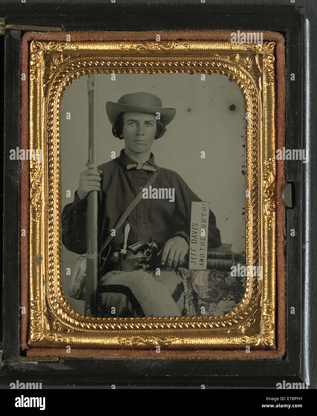 This image features an unidentified Confederate soldier, equipped with ...