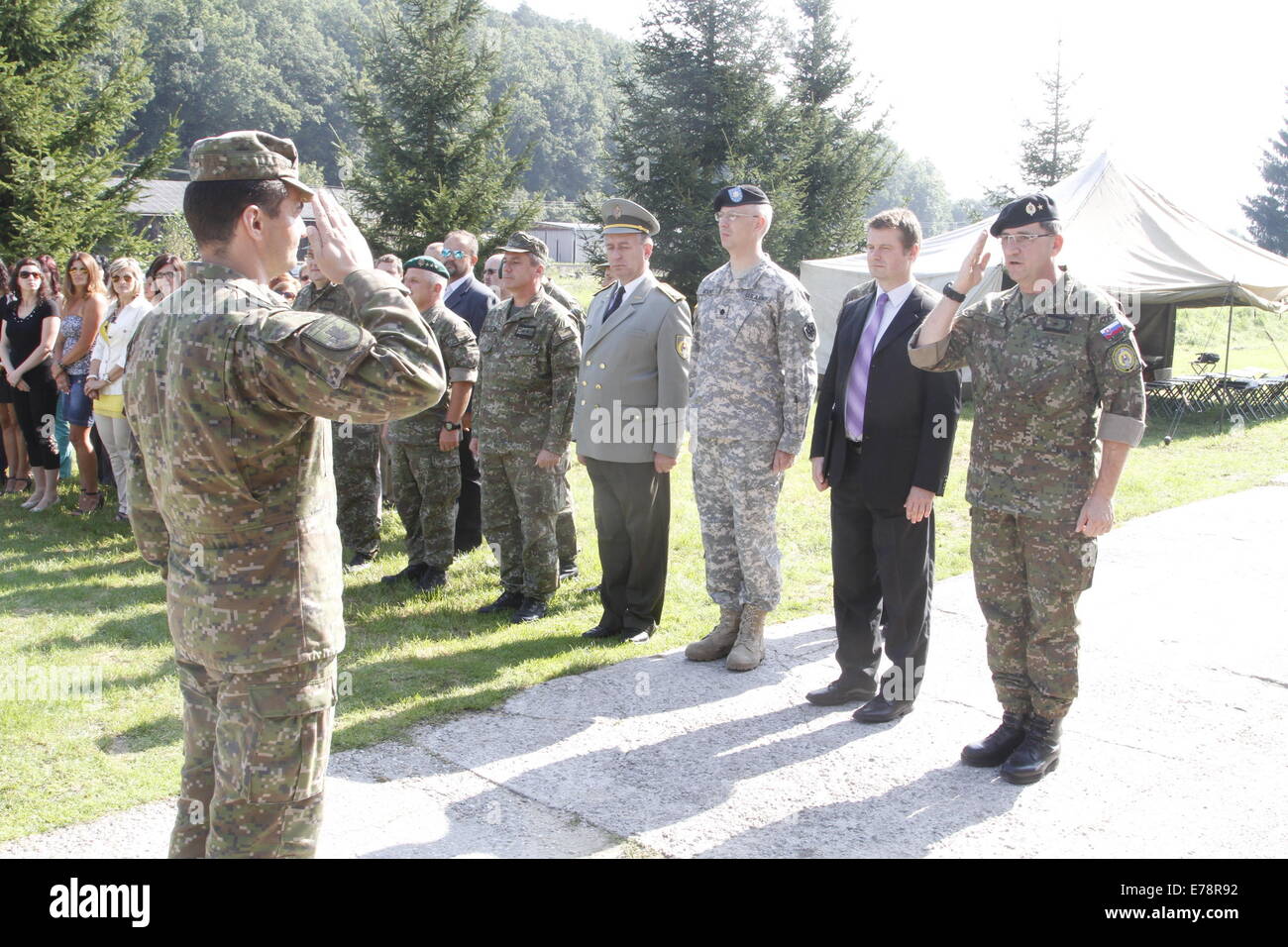 Novaky, Slovakia. 9th Sep, 2014. A sergeant salutes before delivering ...