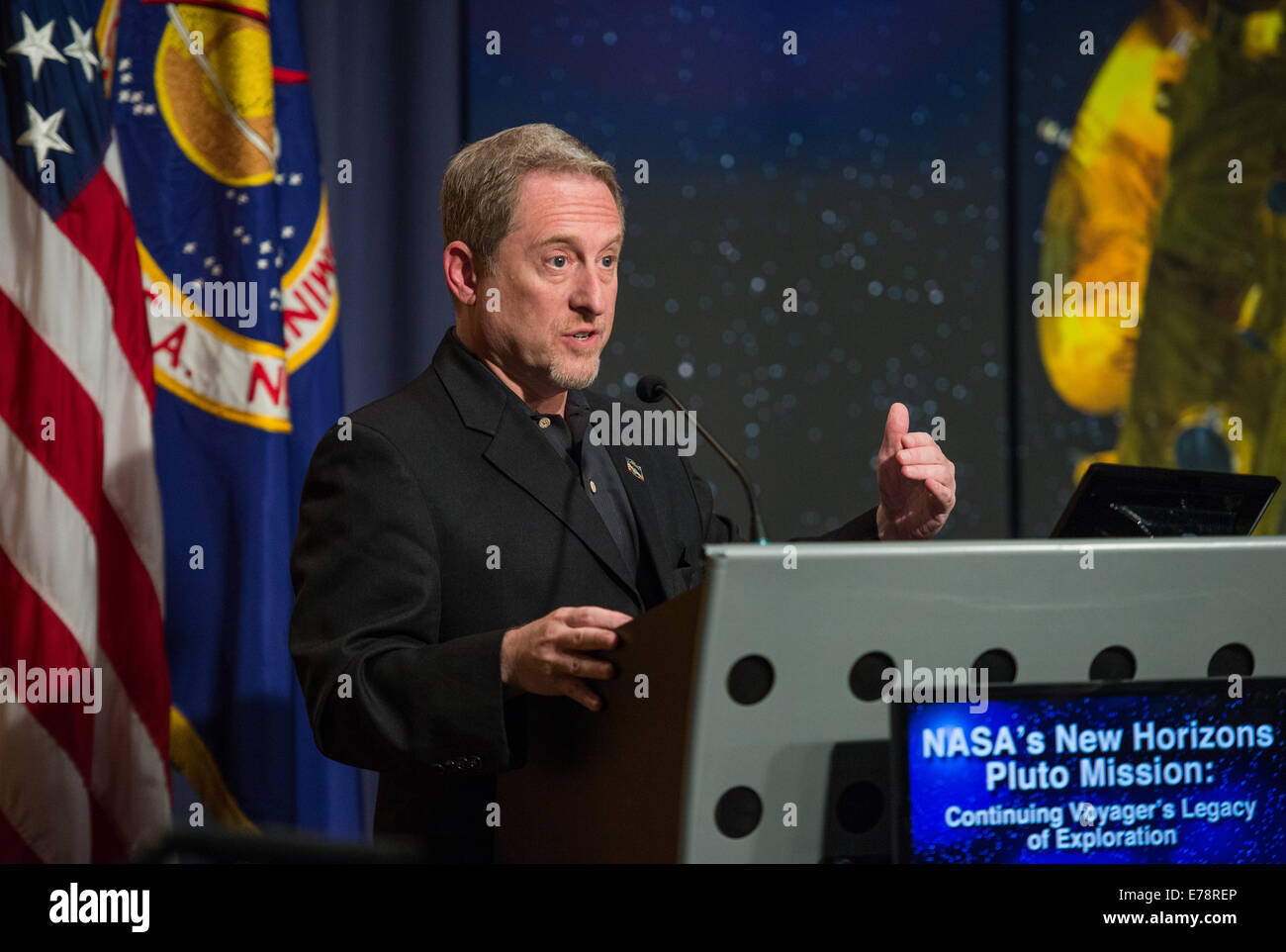 Dr. Alan Stern delivers closing remarks after a panel discussion at ...