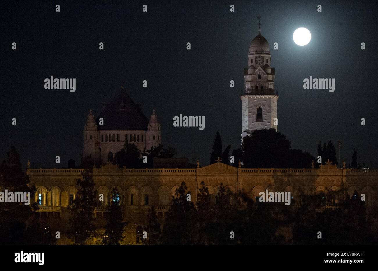 Jerusalem. 9th Sep, 2014. A full moon rises over the Bell Tower of the ...