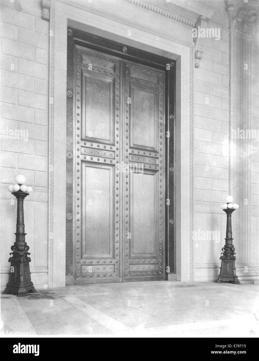 This image shows the entrance doors of the National Archives Building ...