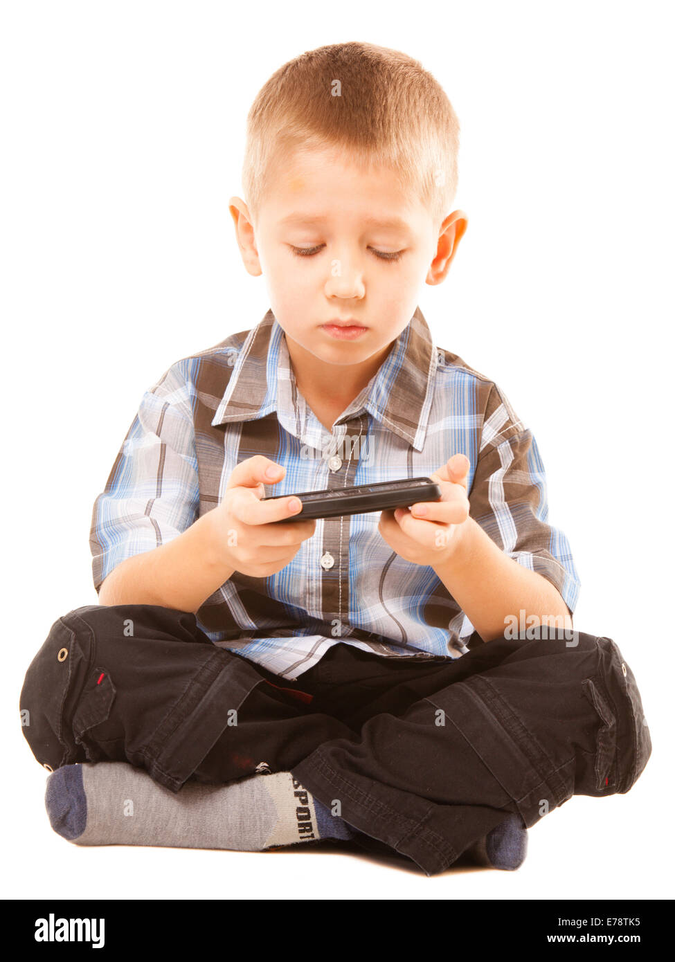 Leisure, technology and internet concept - little boy with smartphone ...