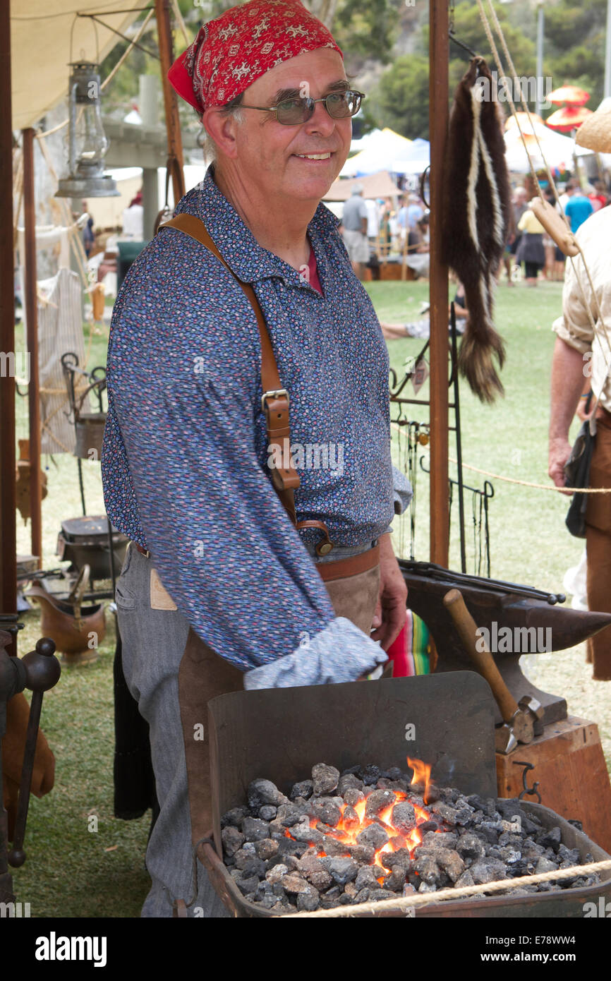 Blacksmith standing by his forge at The Toshiba tall ships festival in ...