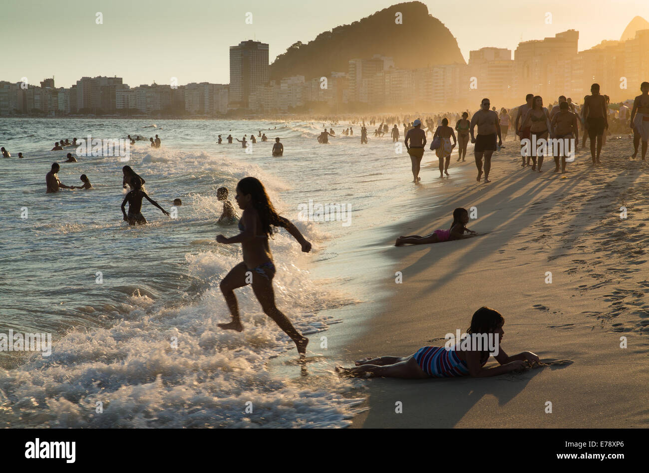 bathers and people relaxing on the Copacabana Beach, Rio de Janeiro ...
