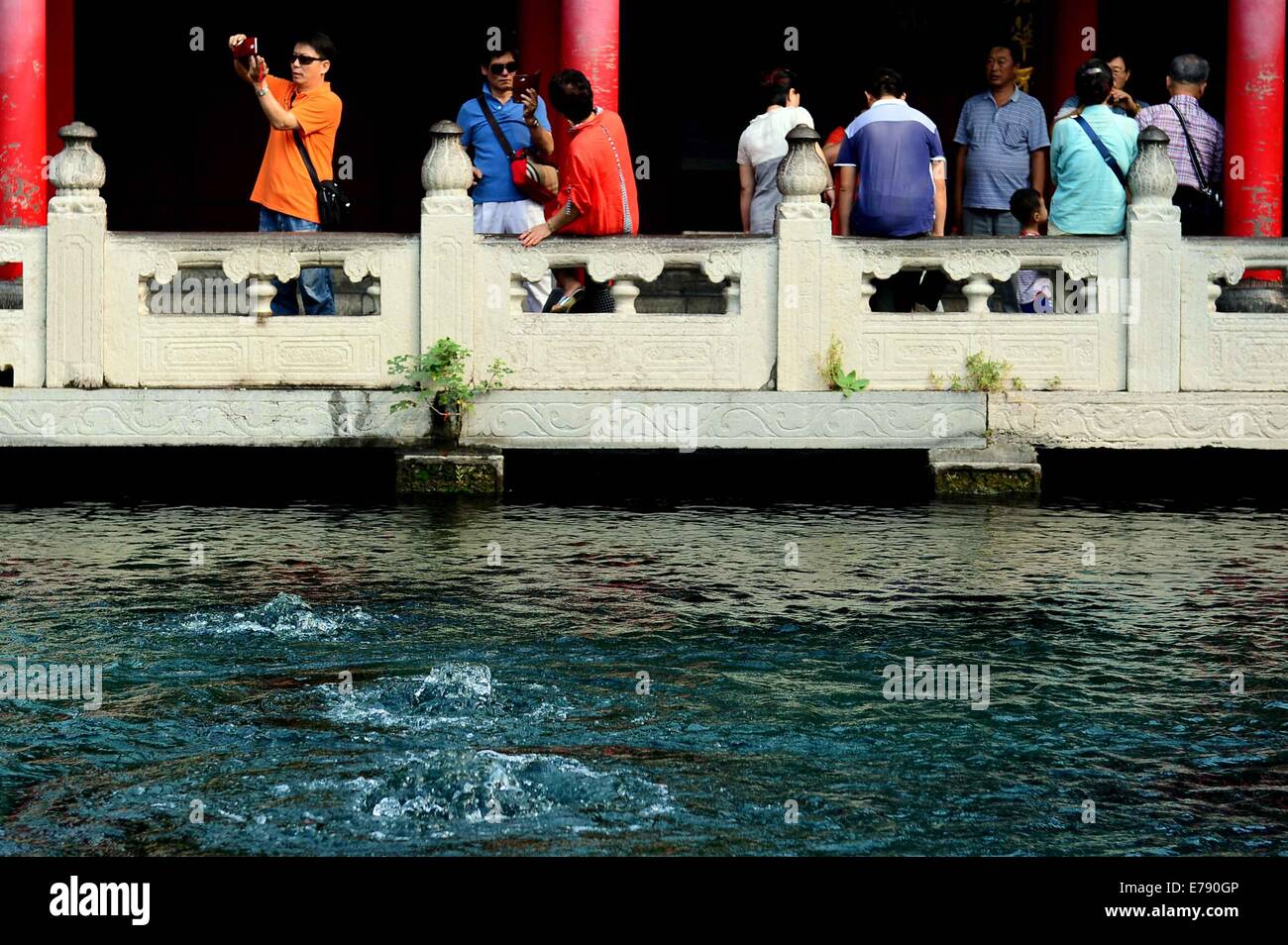 Jinan, Sept. 10. 6th Sep, 2003. Tourists view the Baotu Spring in Jinan ...