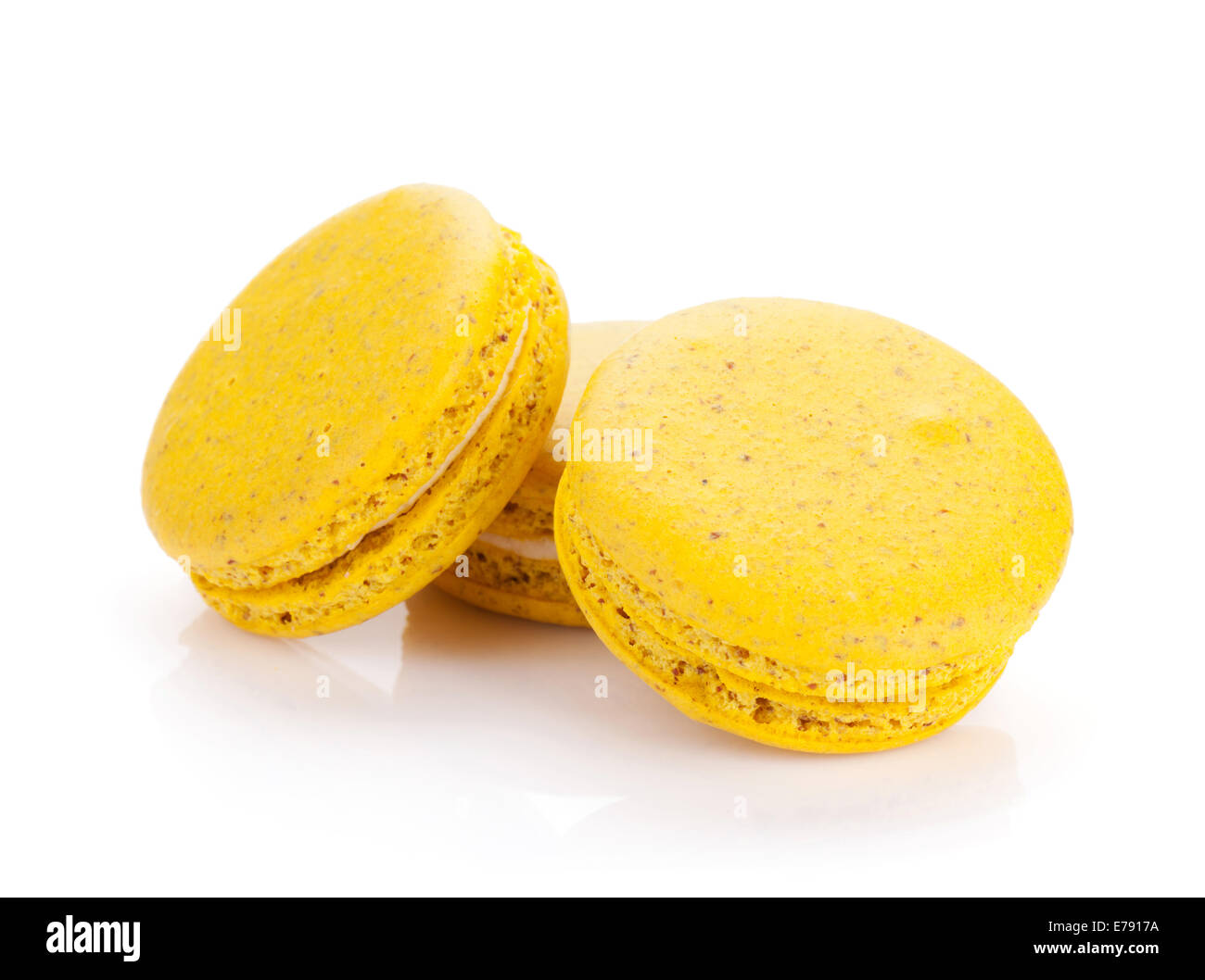 Yellow macaron cookies. Isolated on white background Stock Photo - Alamy