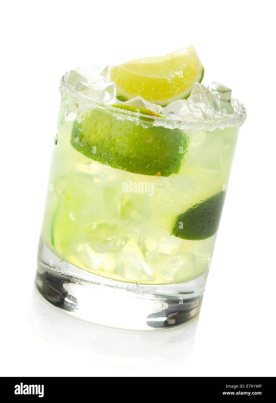 Classic margarita cocktail with salty rim. Isolated on white background ...