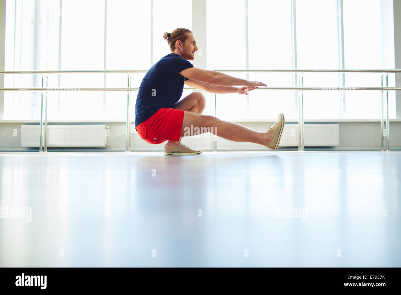 Handsome sportsman in red hi-res stock photography and images - Alamy