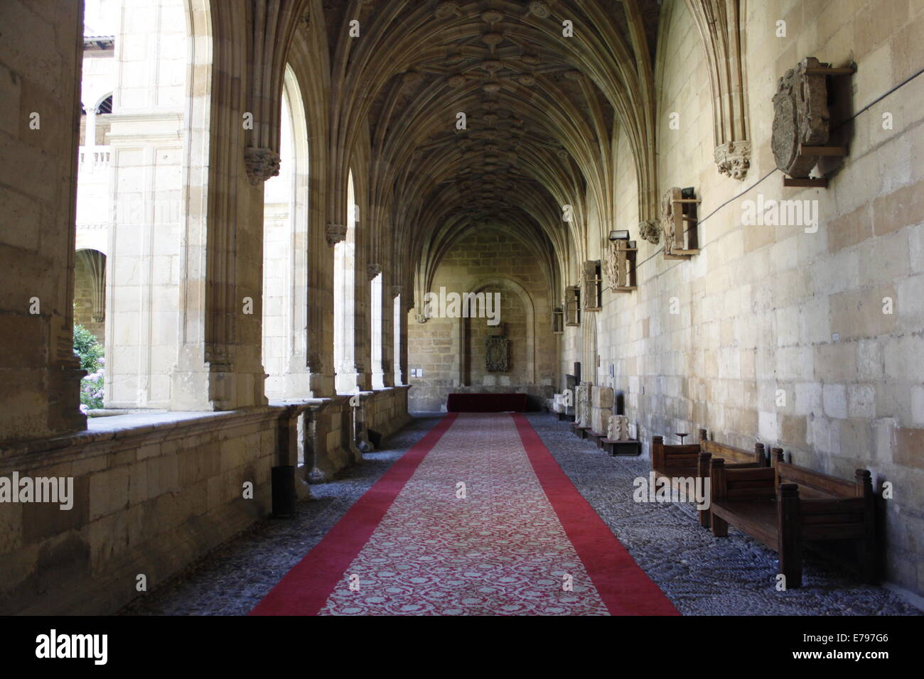 Corridor inside the church which leads to the garden of the Basilica of ...