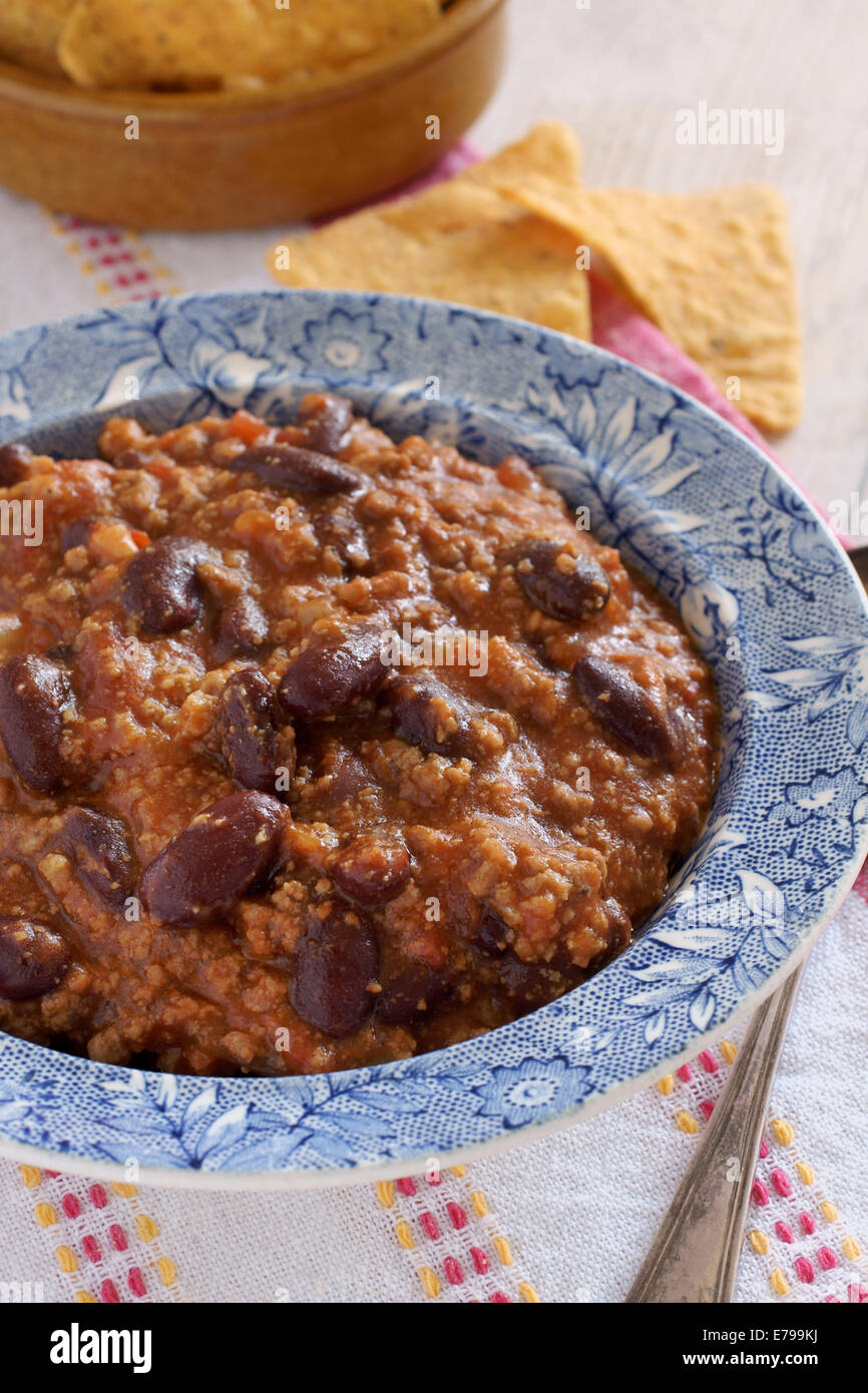 Chilli con Carne served with tortilla chips Stock Photo - Alamy