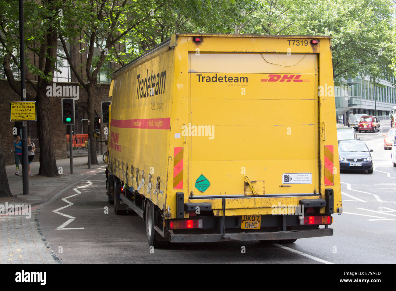 DHL lorry on East Smithfield London Stock Photo - Alamy