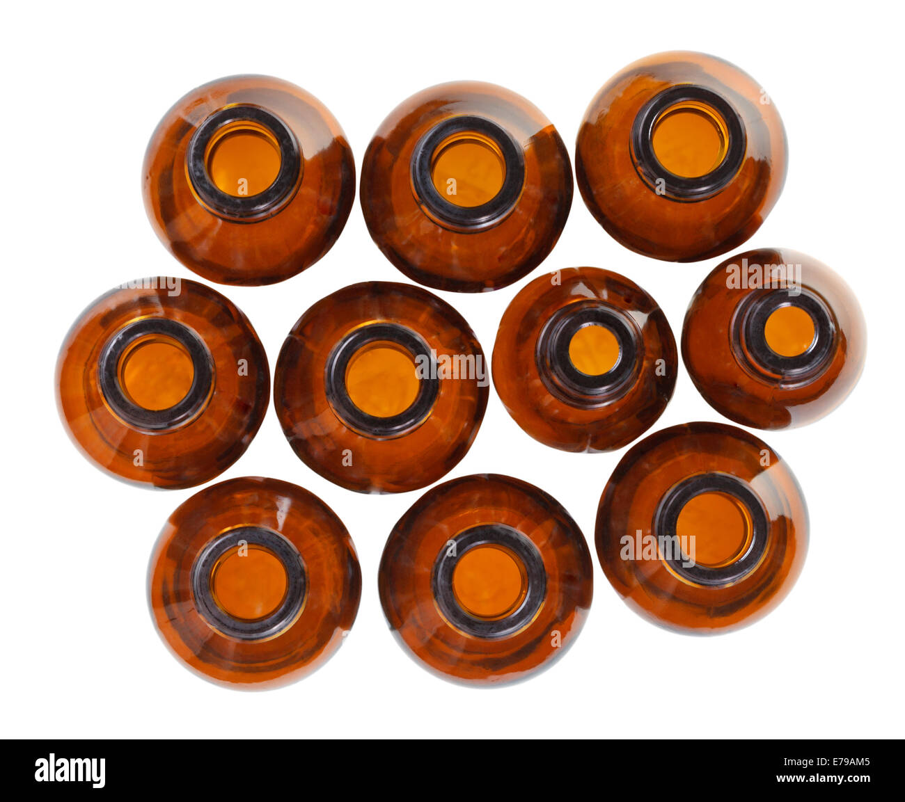 top view of many small open brown glass oval pharmacy bottles isolated ...