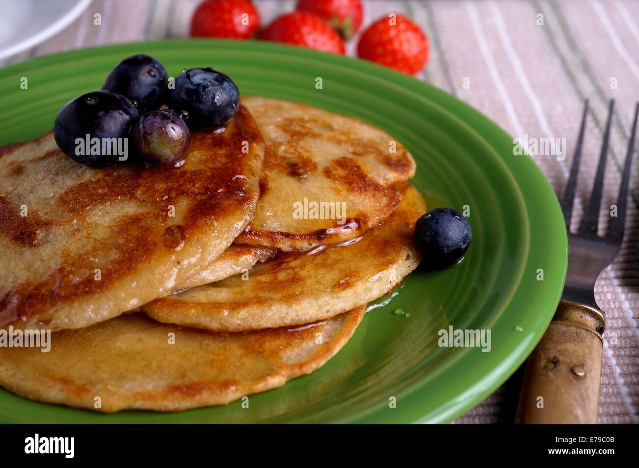 Breakfast table with pancakes and blueberry. closeup Stock Photo - Alamy