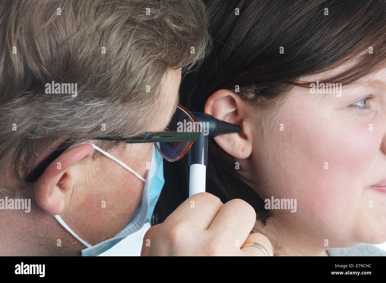 Ear doctor examines a child. Hospital examination Stock Photo - Alamy