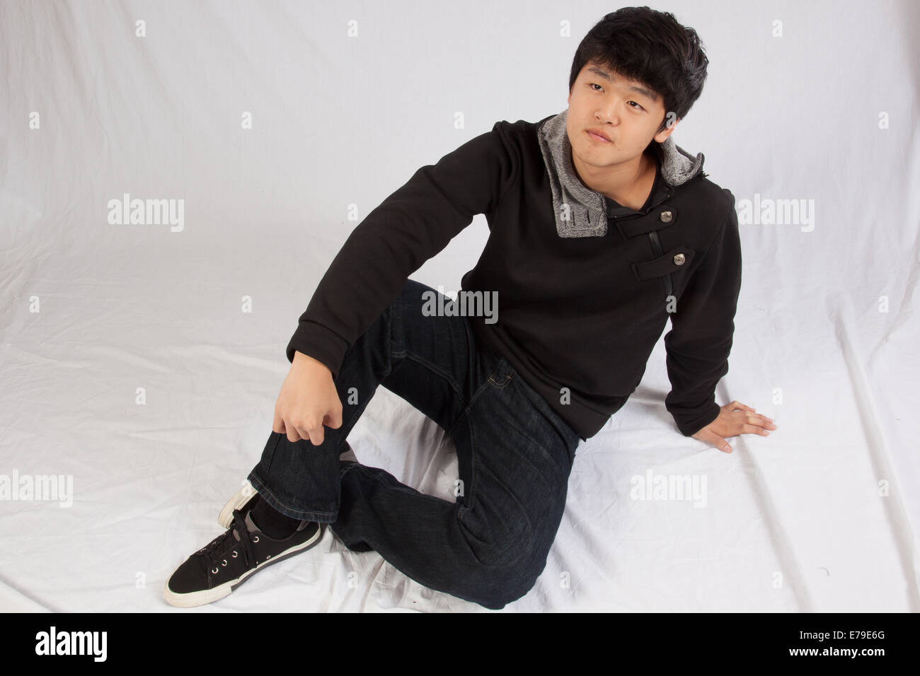 Asian man relaxing on floor hi-res stock photography and images - Alamy