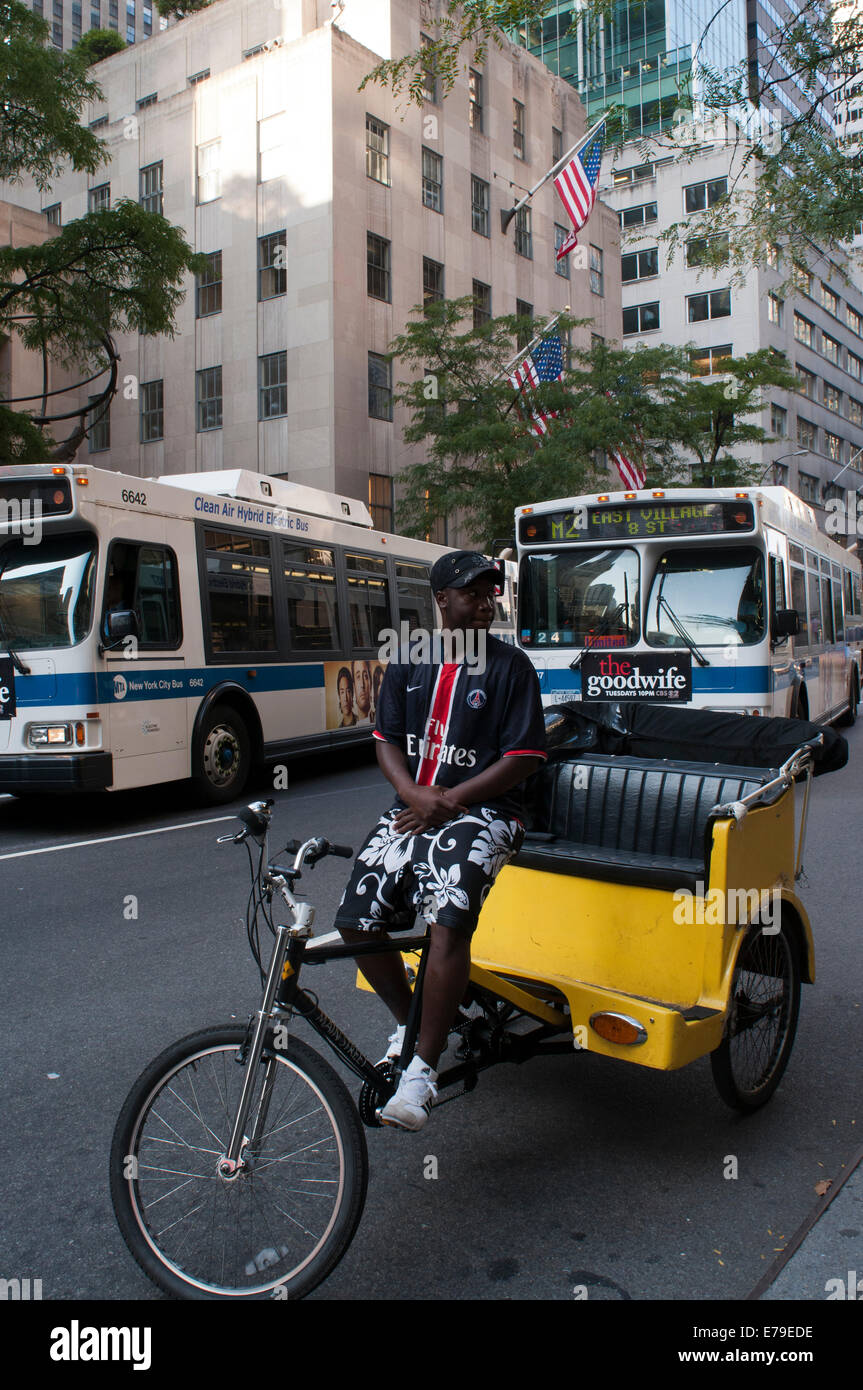 Yellow pedicabs hi-res stock photography and images - Alamy