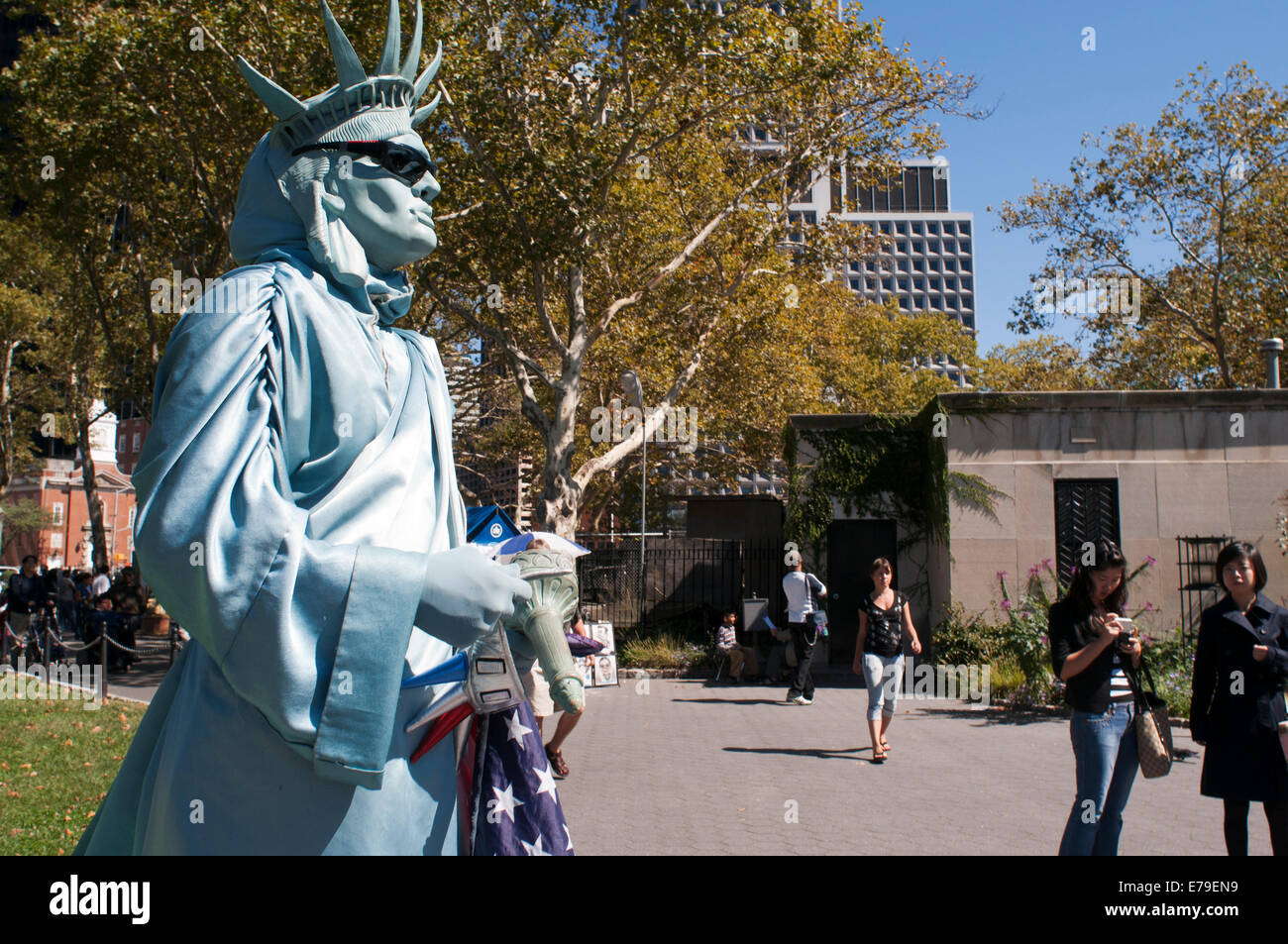 Battery Park City. A large green area with a promenade along the Hudson ...