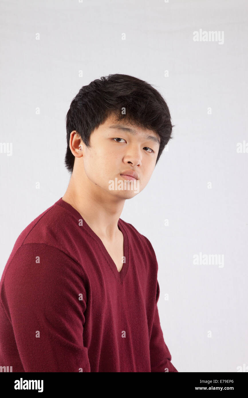 Asian man serious looking at camera hi-res stock photography and images ...