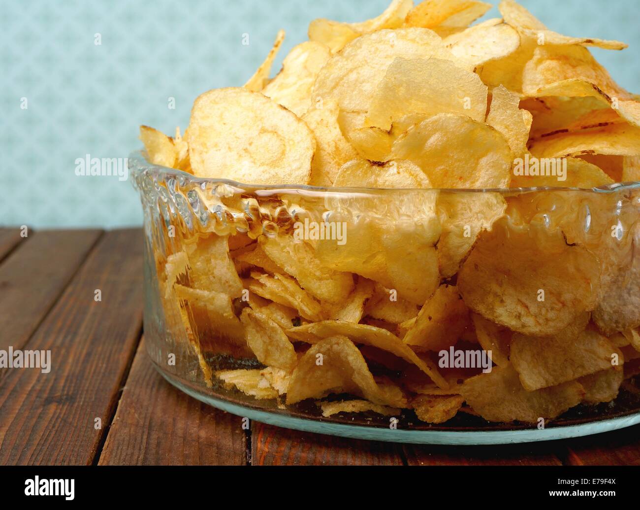 Potato chips, Unhealthy fried snack, Close up Stock Photo - Alamy