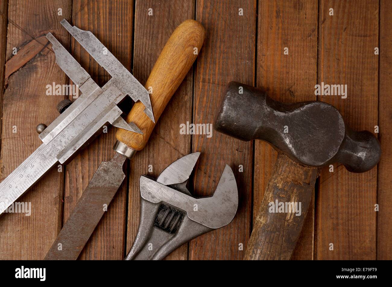 Hammer, caliper, file and wrench Old tools, vintage/ used Stock Photo ...