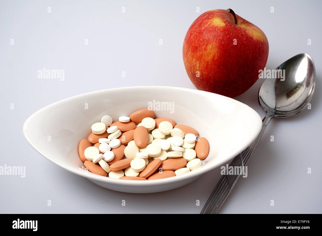 Pills in a bowl hi-res stock photography and images - Alamy