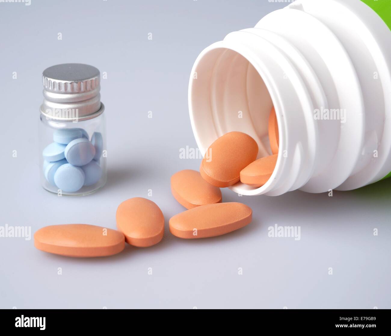 two kind of Medicine in bottle on white background Stock Photo - Alamy