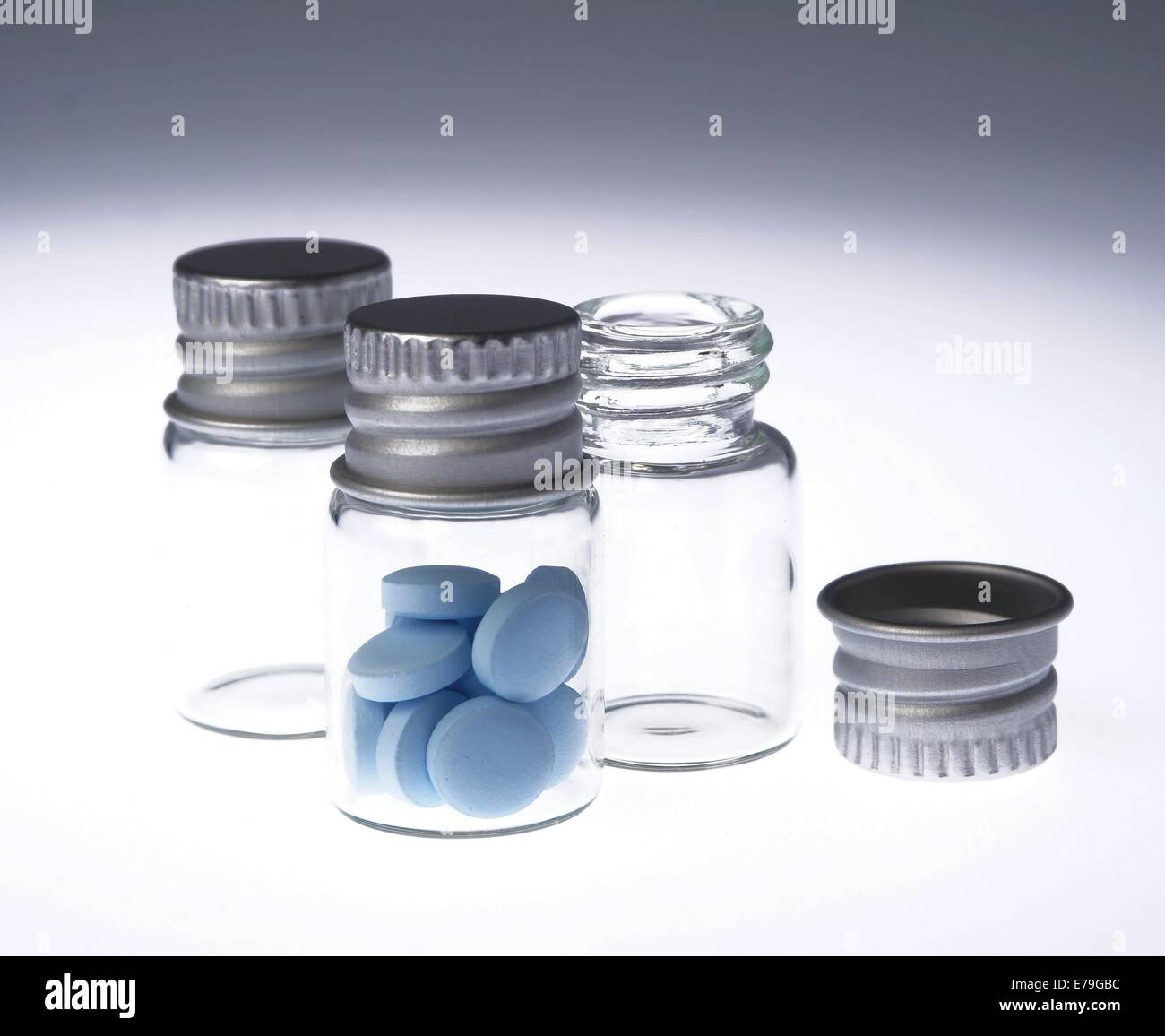 Clear blue pill hi-res stock photography and images - Alamy