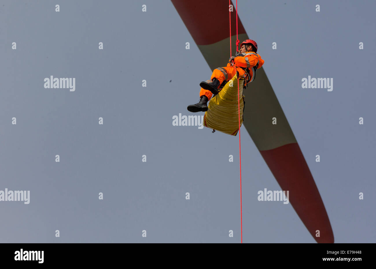 Parchim, Germany. 10th Sep, 2014. A fire fighter ropes down with a ...