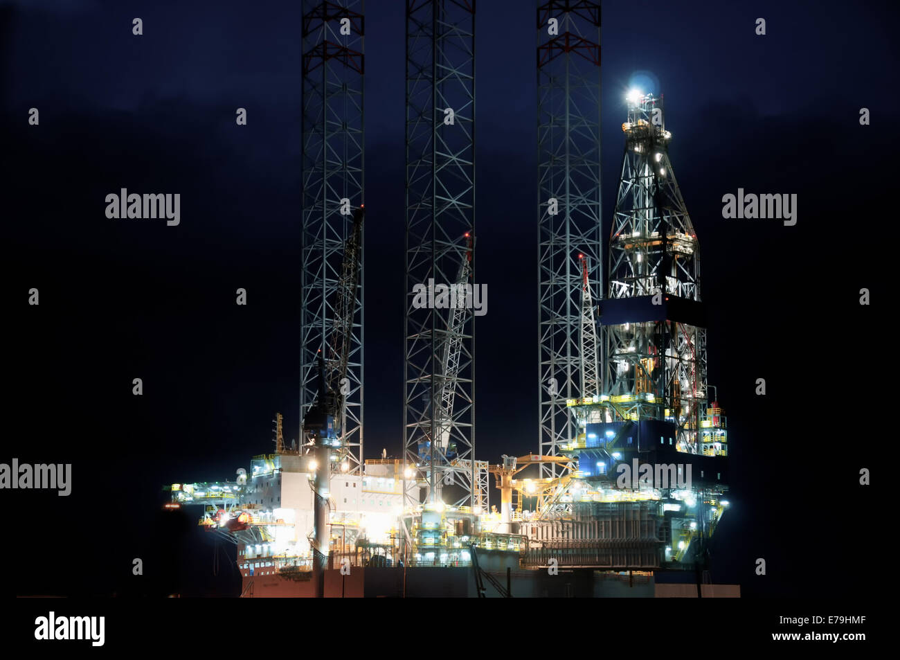 Off shore oil rig at night Stock Photo - Alamy