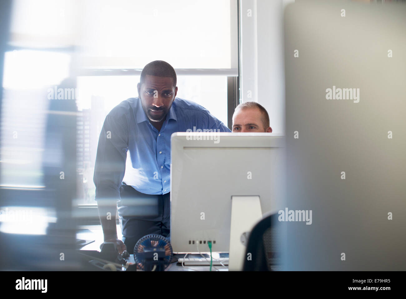 Working in front of computer hi-res stock photography and images - Alamy