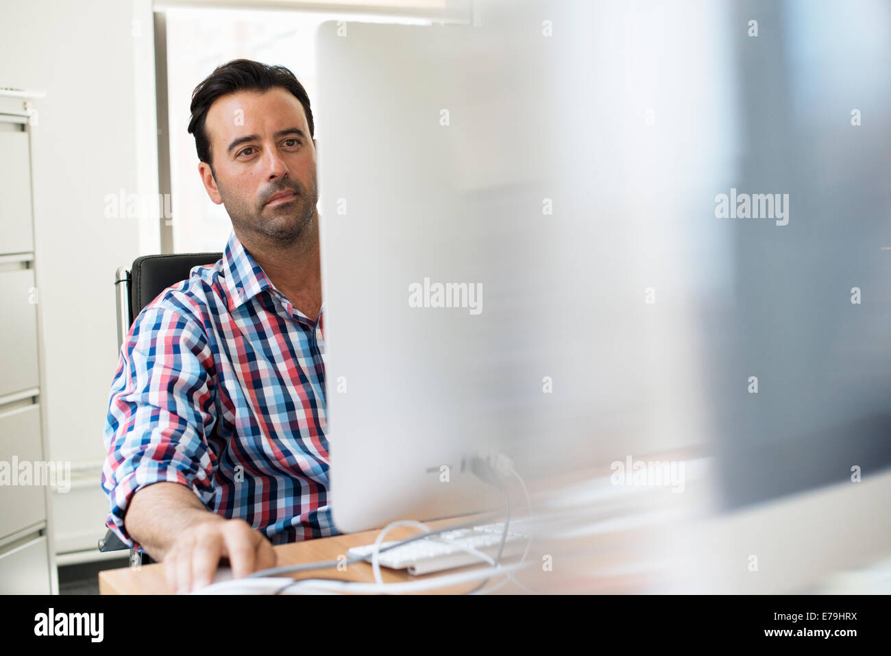 Indian man working at office hi-res stock photography and images - Alamy