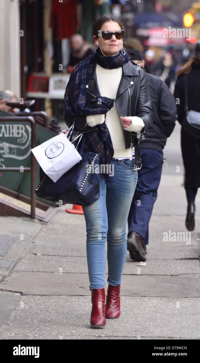 Katie Holmes looking fashionable in a leather motorcycle jacket as she ...