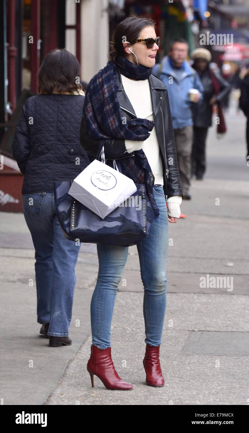 Katie Holmes looking fashionable in a leather motorcycle jacket as she ...